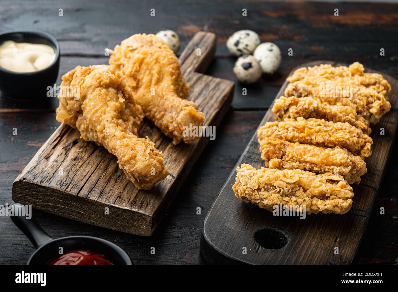 Southern fried chicken cuts on dark wooden background Stock Photo - Alamy