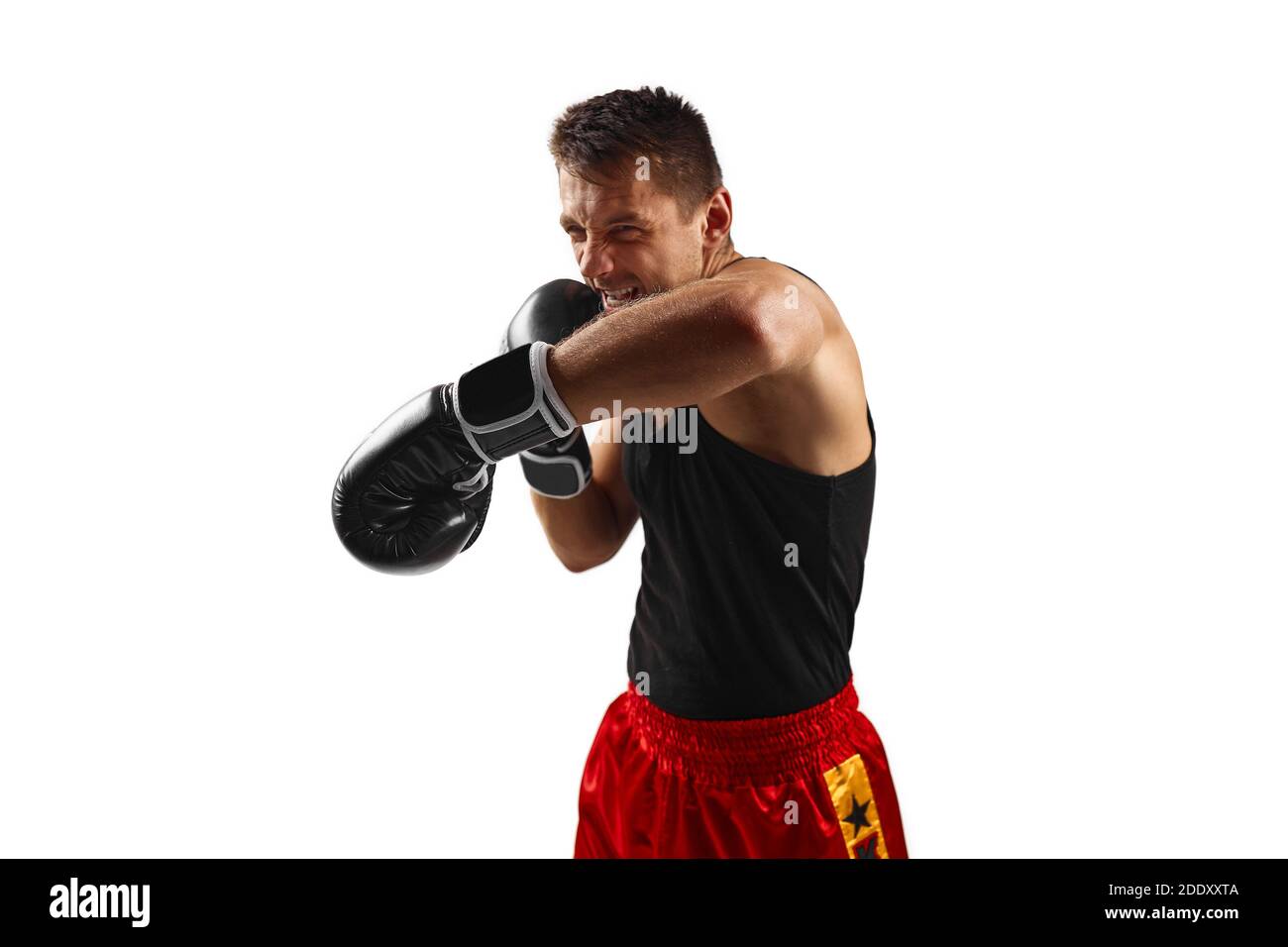 boxer man in black boxing gloves punching isolated on white background ...