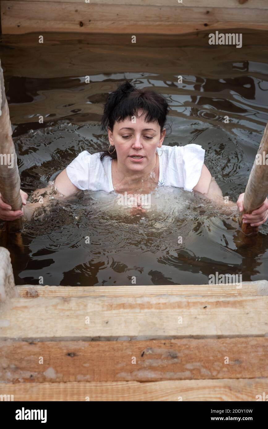 Bathing in the ice hole hi-res stock photography and images - Alamy
