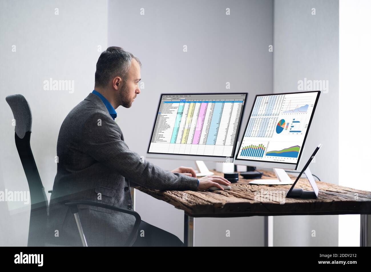Employee working on computer plan hi-res stock photography and images ...