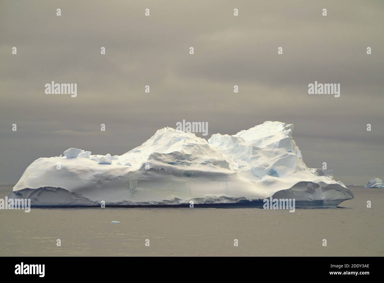 The iceberg is surrounded by the sea. The scenery seen during the ...
