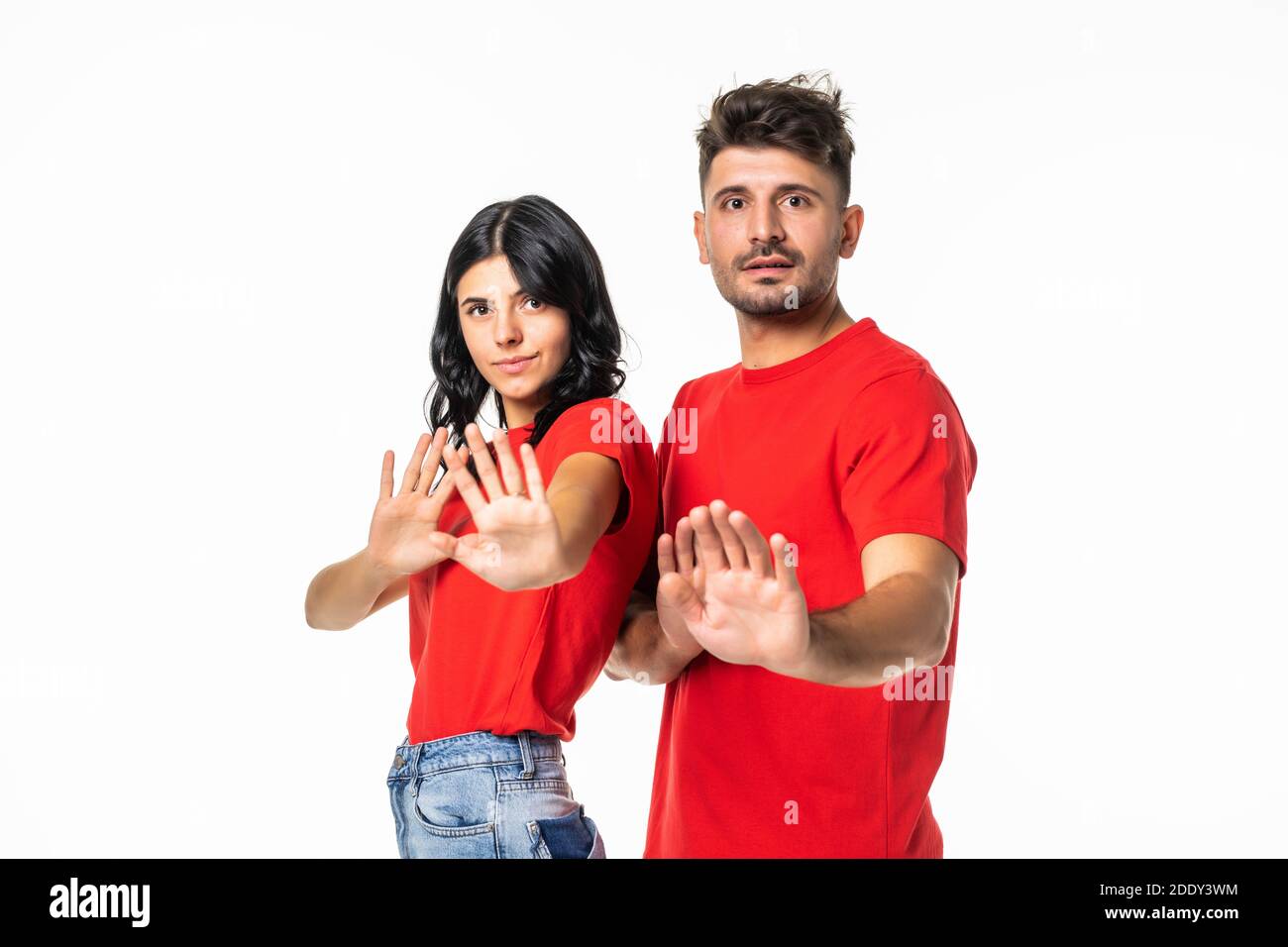 Young beautiful couple hugging together over white isolated background ...