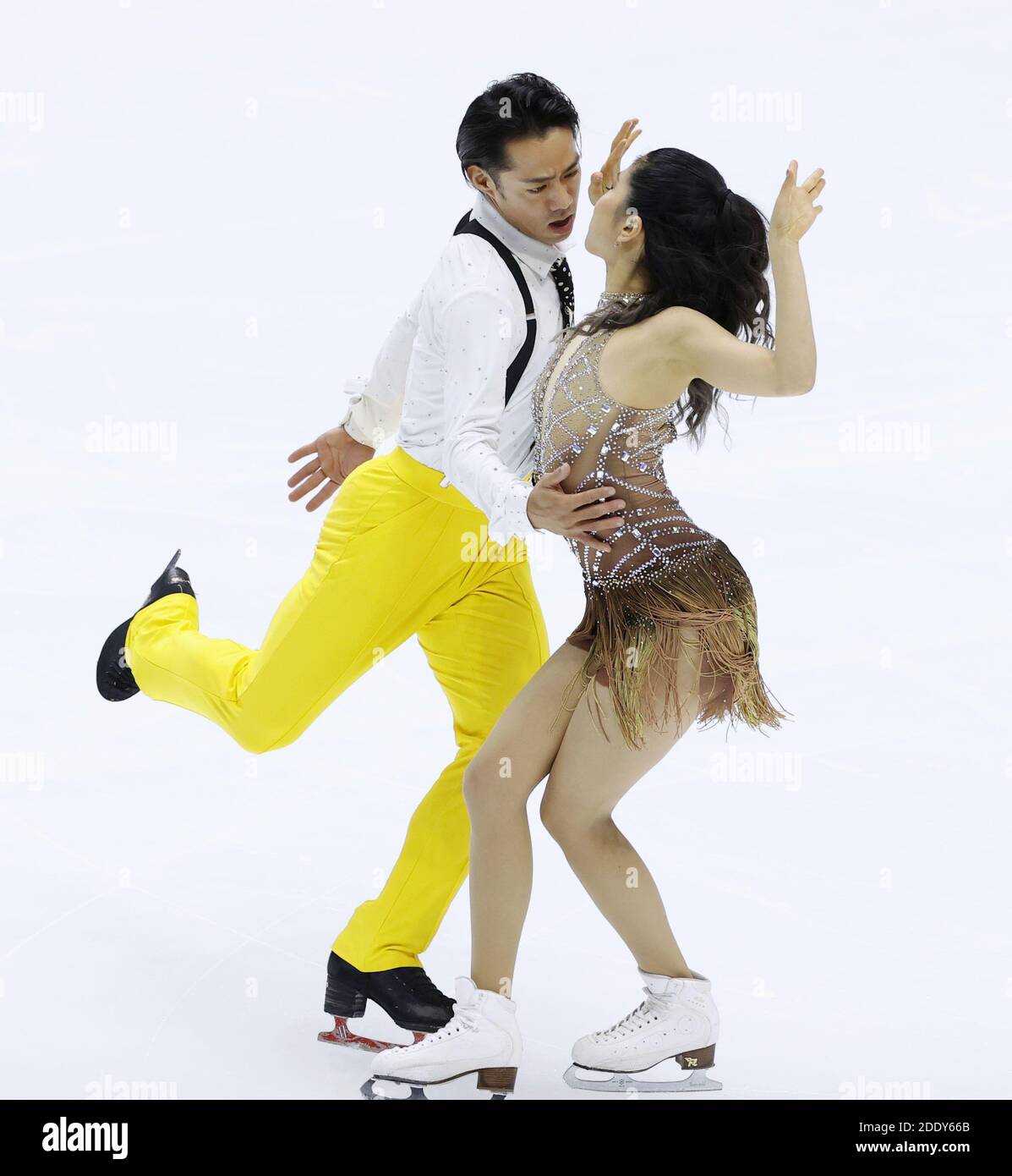 Japanese ice dancing duo Kana Muramoto (R) and Daisuke Takahashi ...