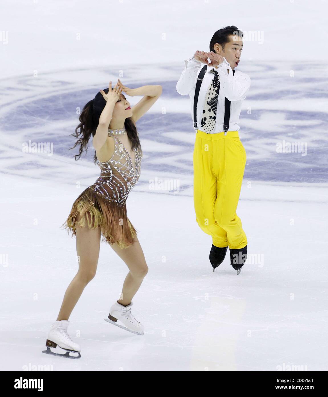 Japanese ice dancing duo Kana Muramoto (L) and Daisuke Takahashi ...