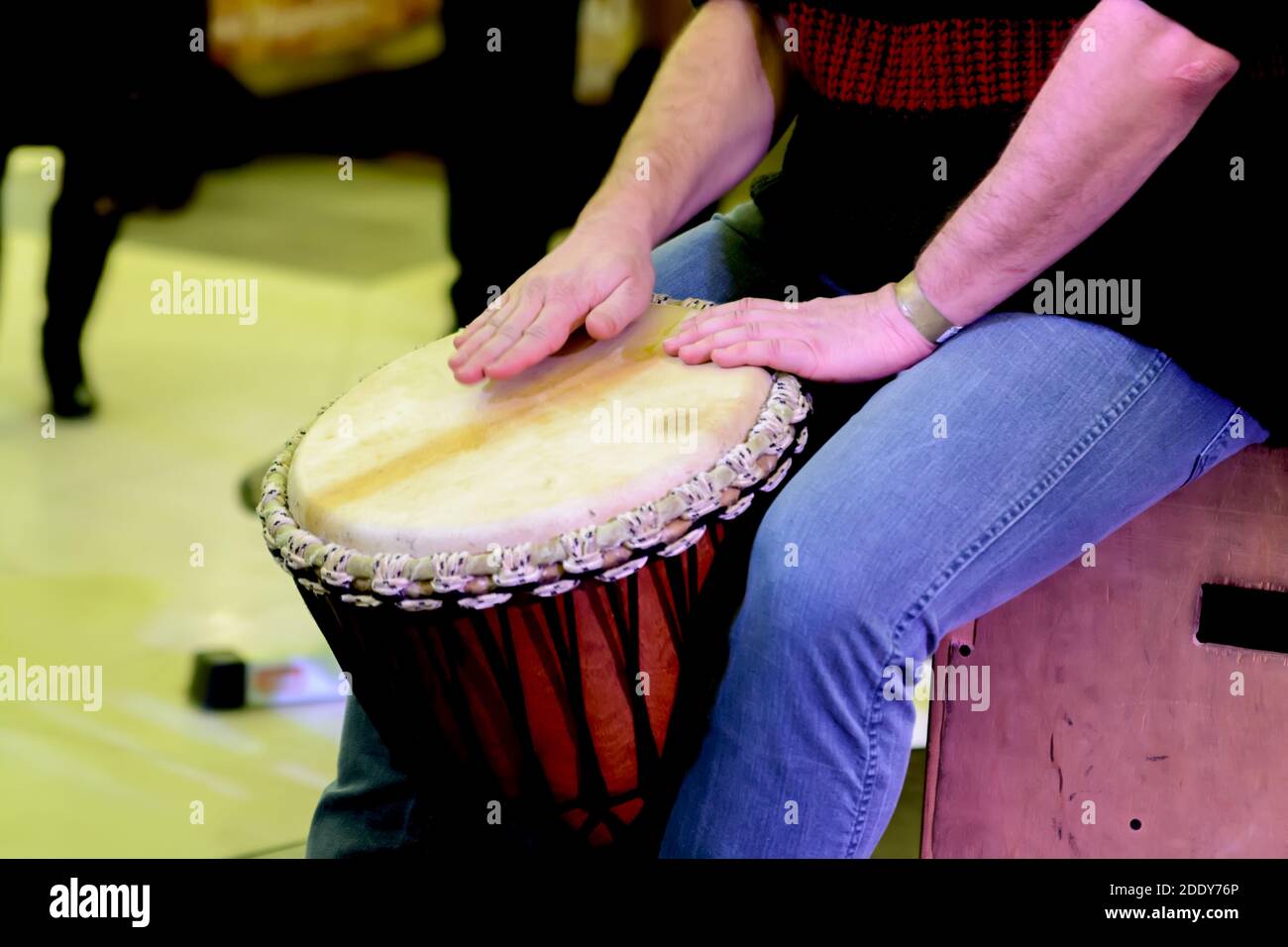 Man playing the drum. Post processing Stock Photo - Alamy