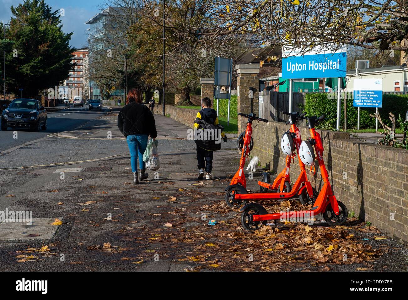 Slough, Berkshire, UK. 15th November, 2020. E scooters parked outside ...
