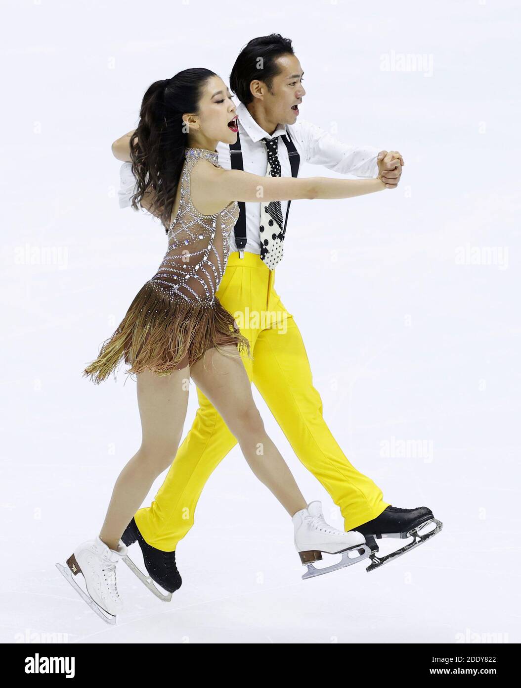 Japanese ice dancing duo Kana Muramoto (L) and Daisuke Takahashi ...