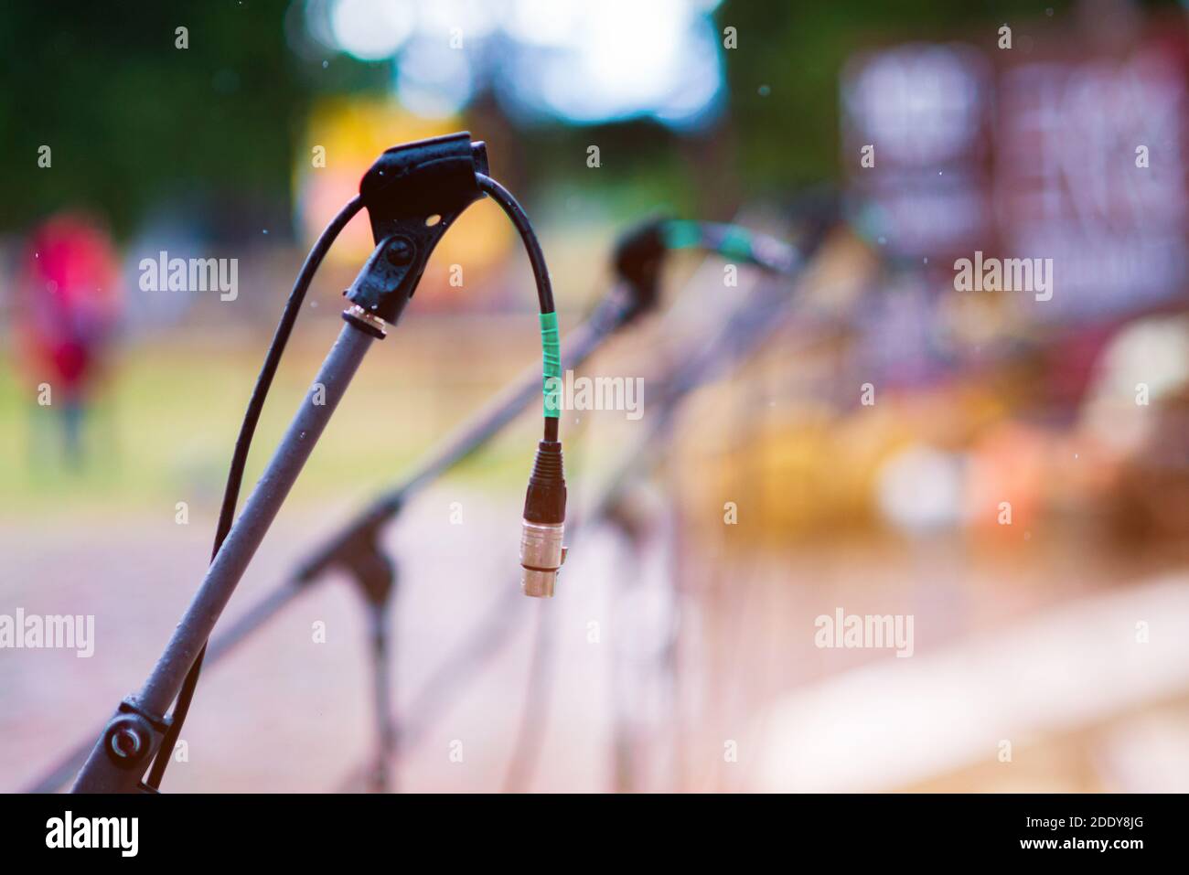 Stand with cable and plug for connecting a microphone Stock Photo - Alamy