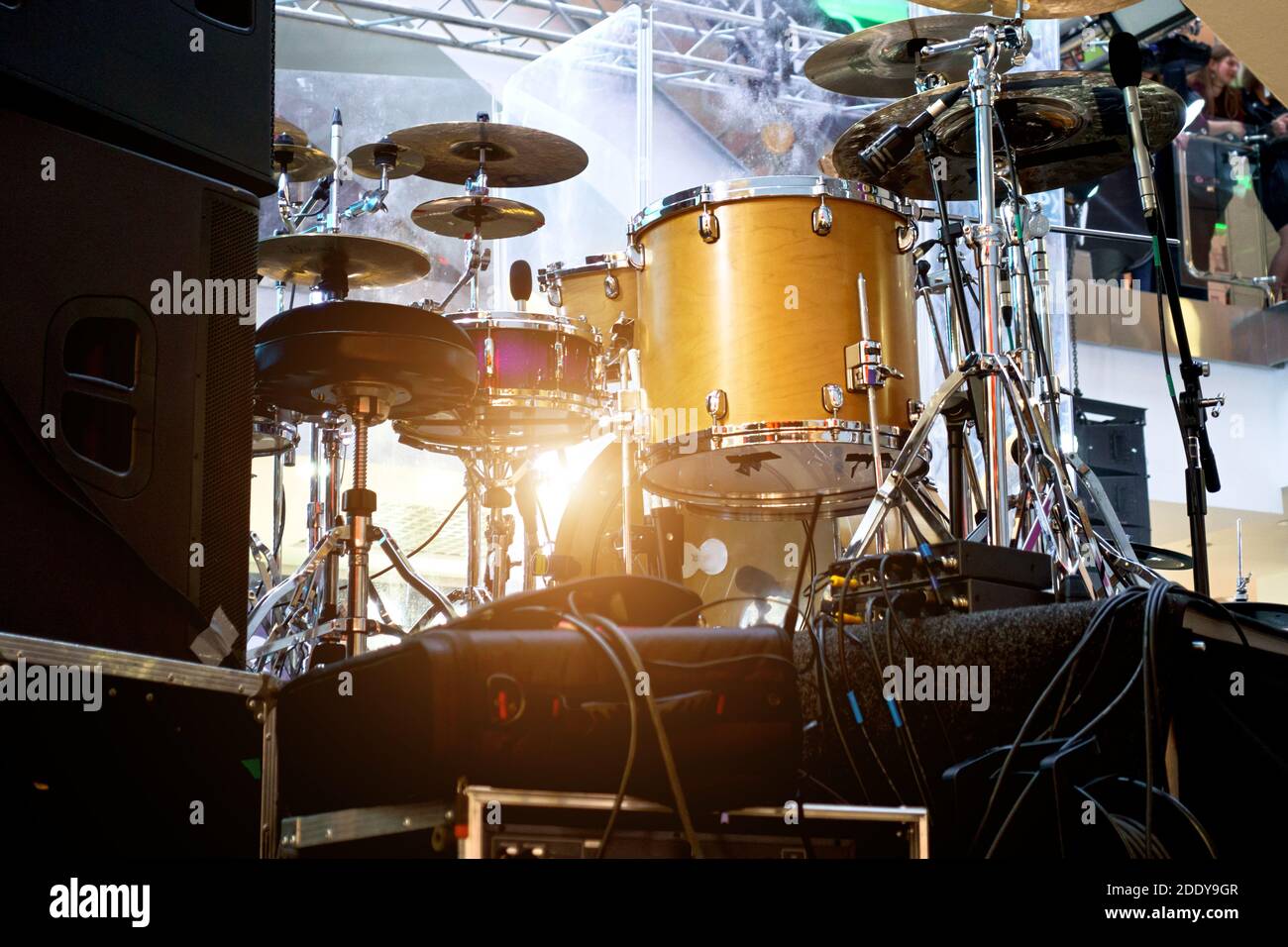 Concert drum set.The drums are golden on stage Stock Photo - Alamy