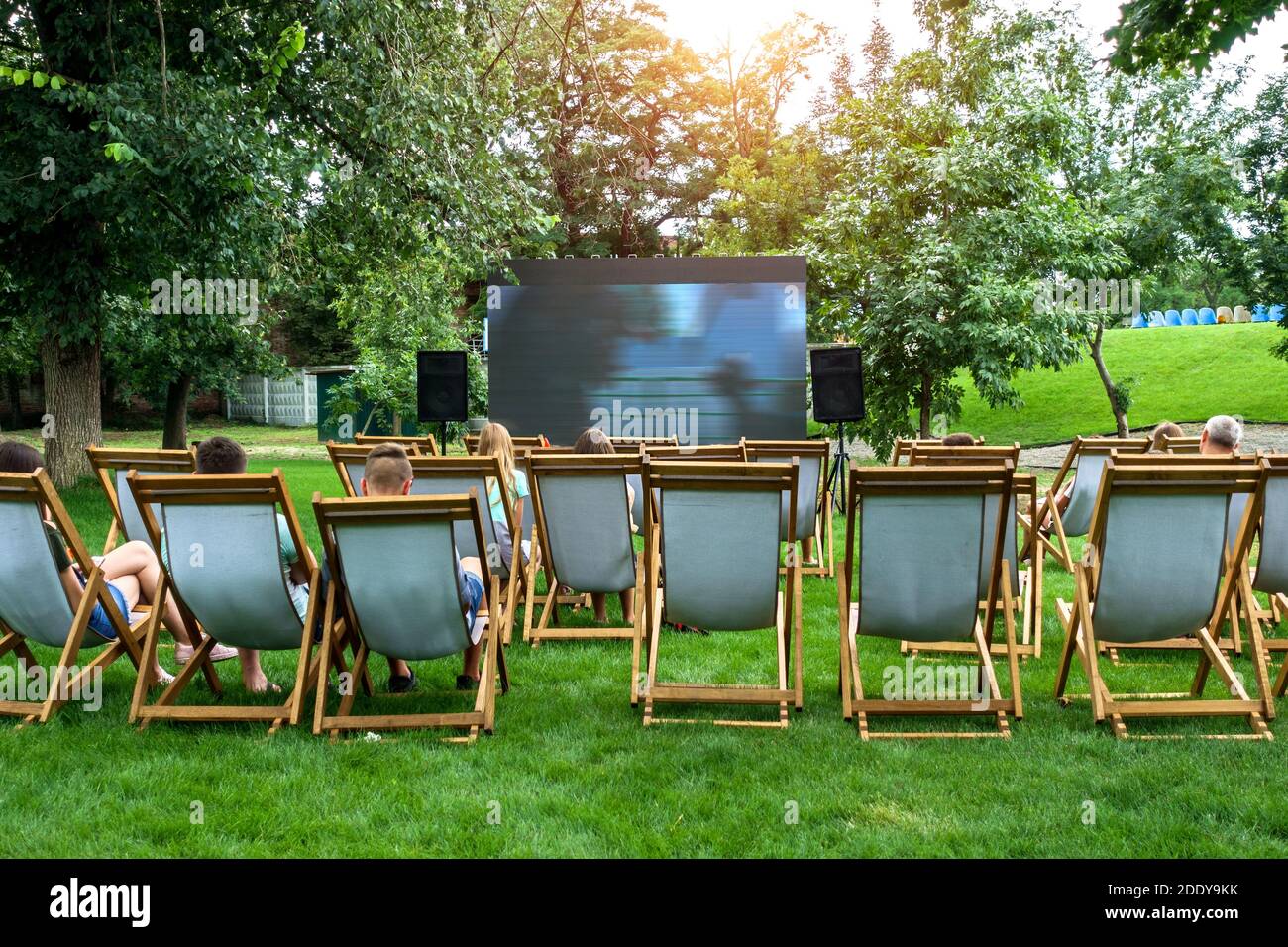Group watching movie outside hi-res stock photography and images - Alamy