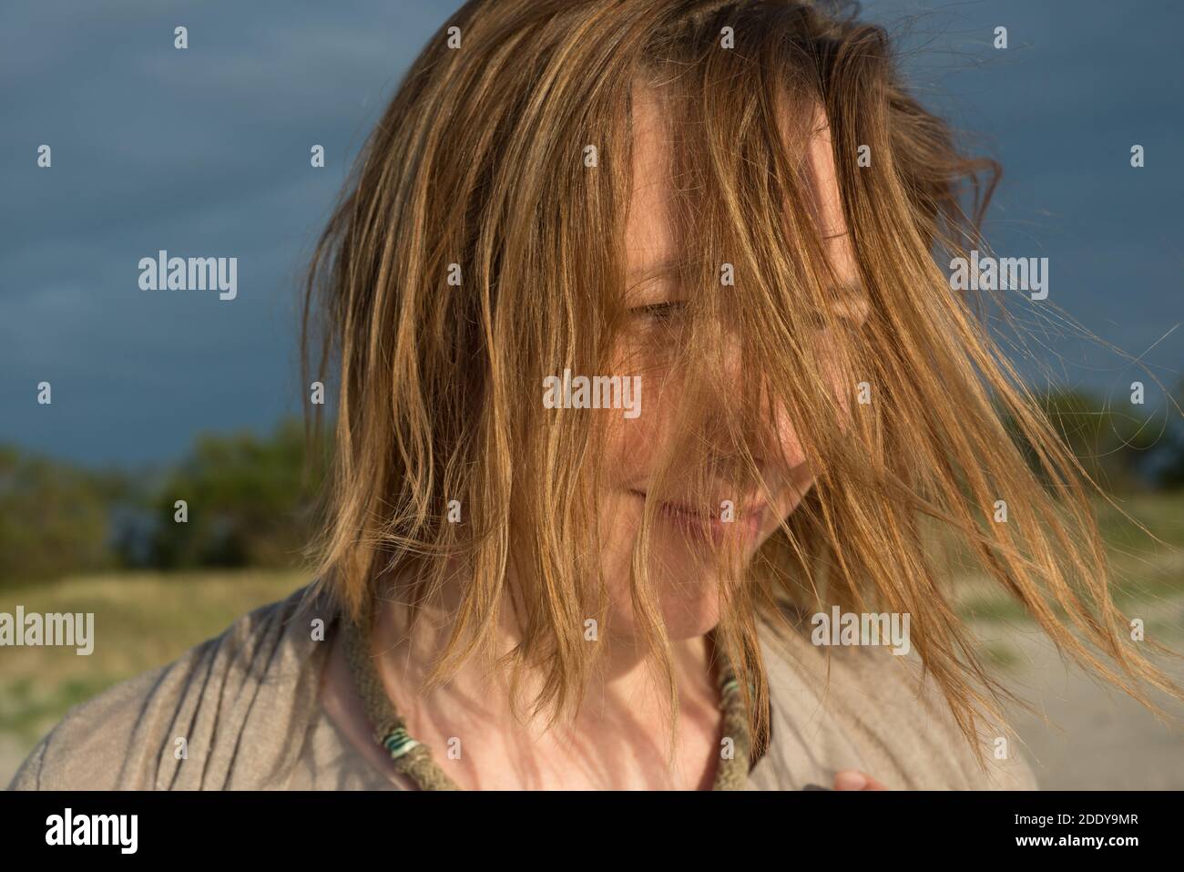 Woman's face is covered with hair Stock Photo - Alamy