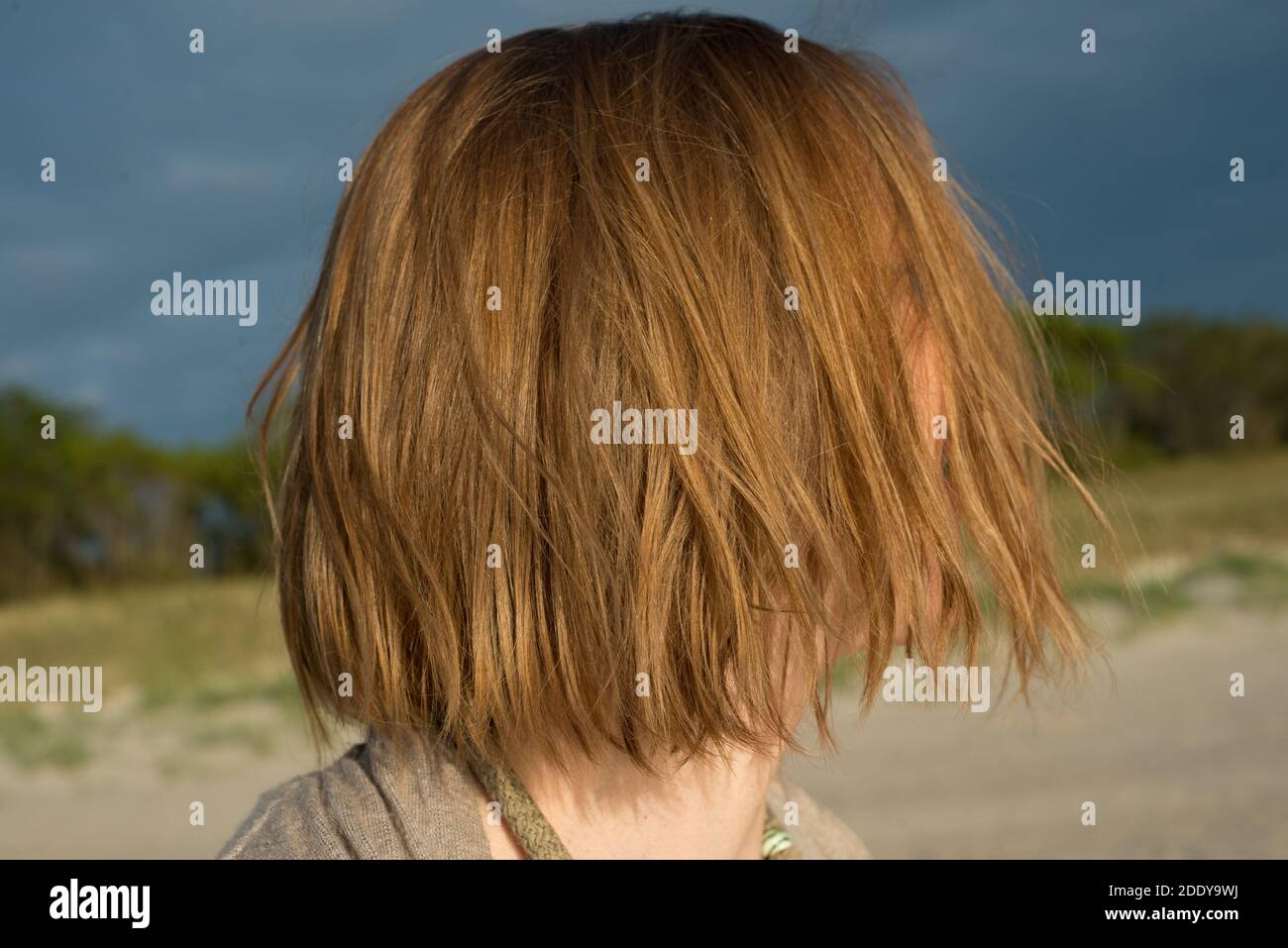 Woman's face is covered with hair Stock Photo - Alamy