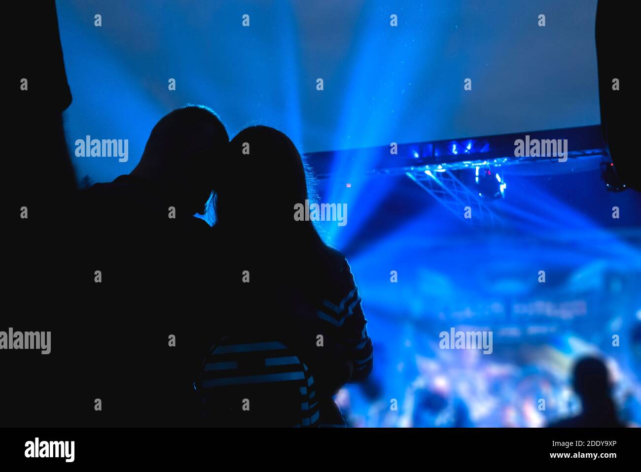 Couple at a rock concert Stock Photo - Alamy