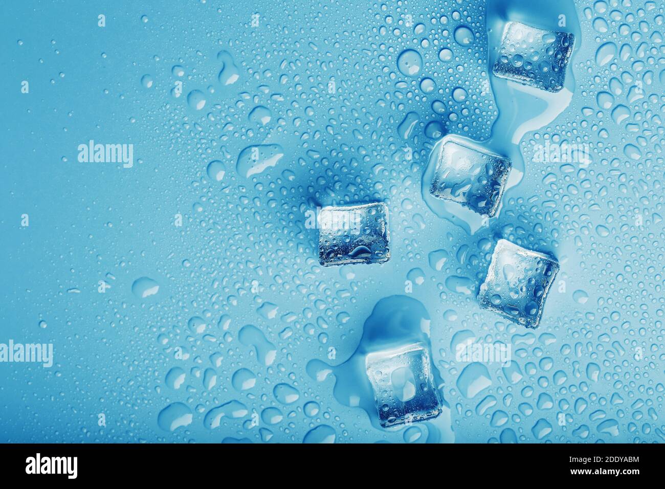 Blocks of Ice With water Drops close-up. Macro ice refreshing cube for ...