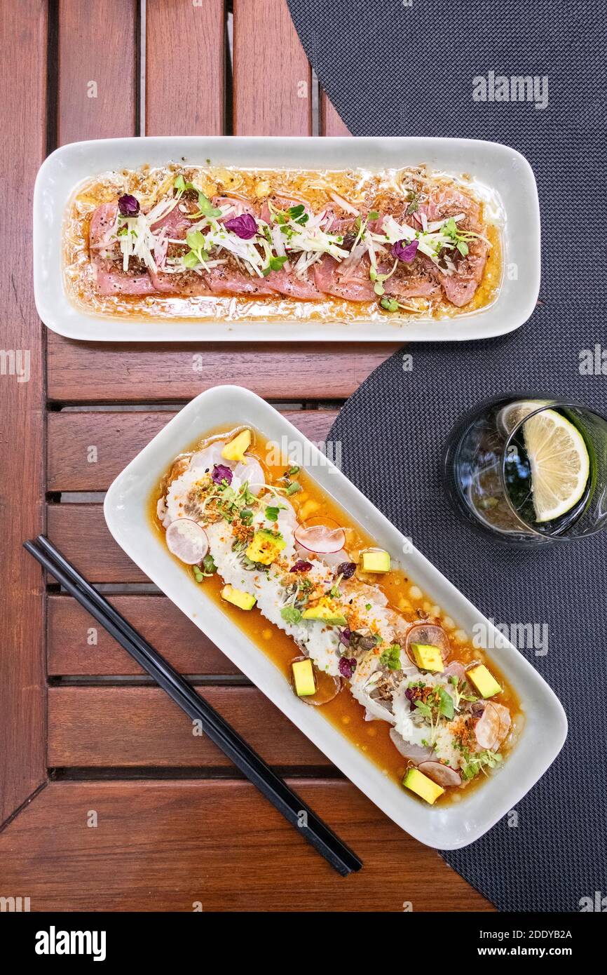 Tuna and red snapper Carpaccio, candid light, top view , vertical ...