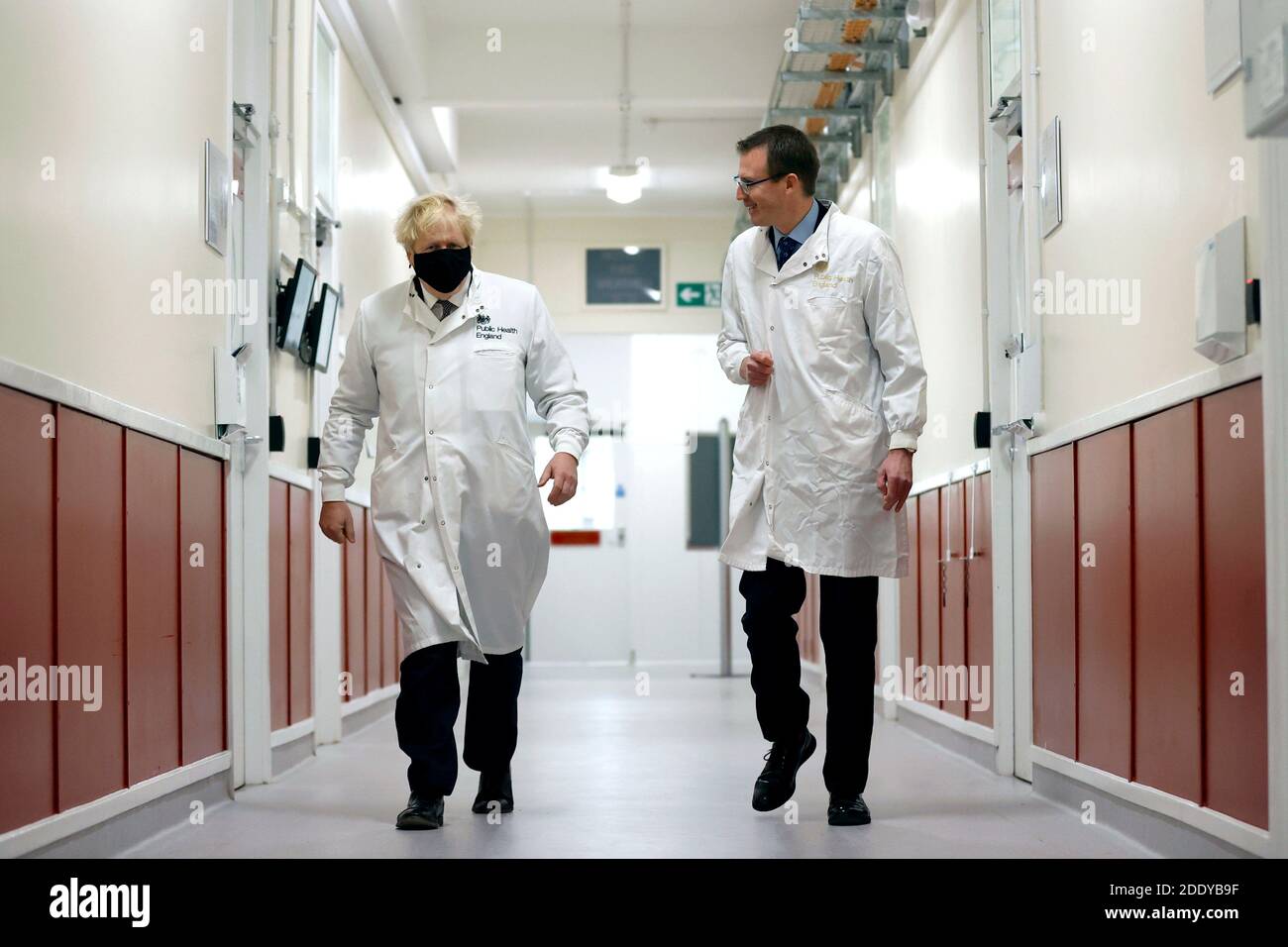 Prime Minister Boris Johnson (left) walks with Director of Public ...