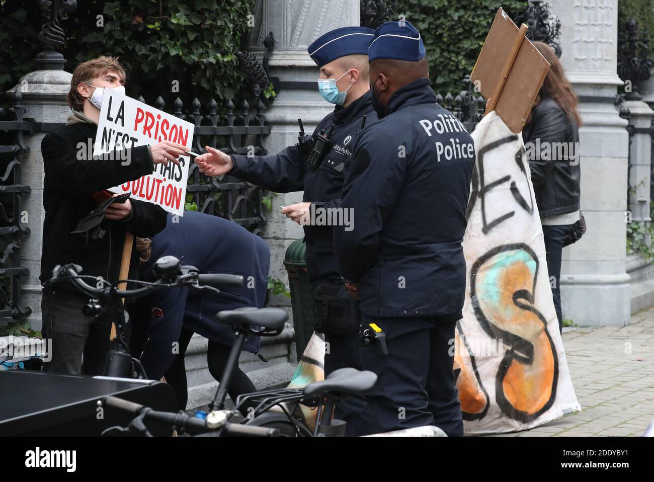 Illustration shows police officers asking a few people to leave, as ...