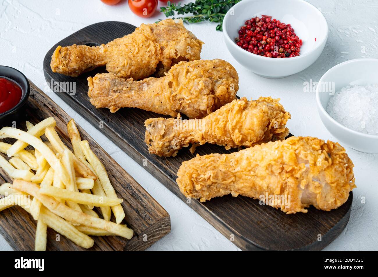 Crispy fried chicken cuts on white background Stock Photo - Alamy