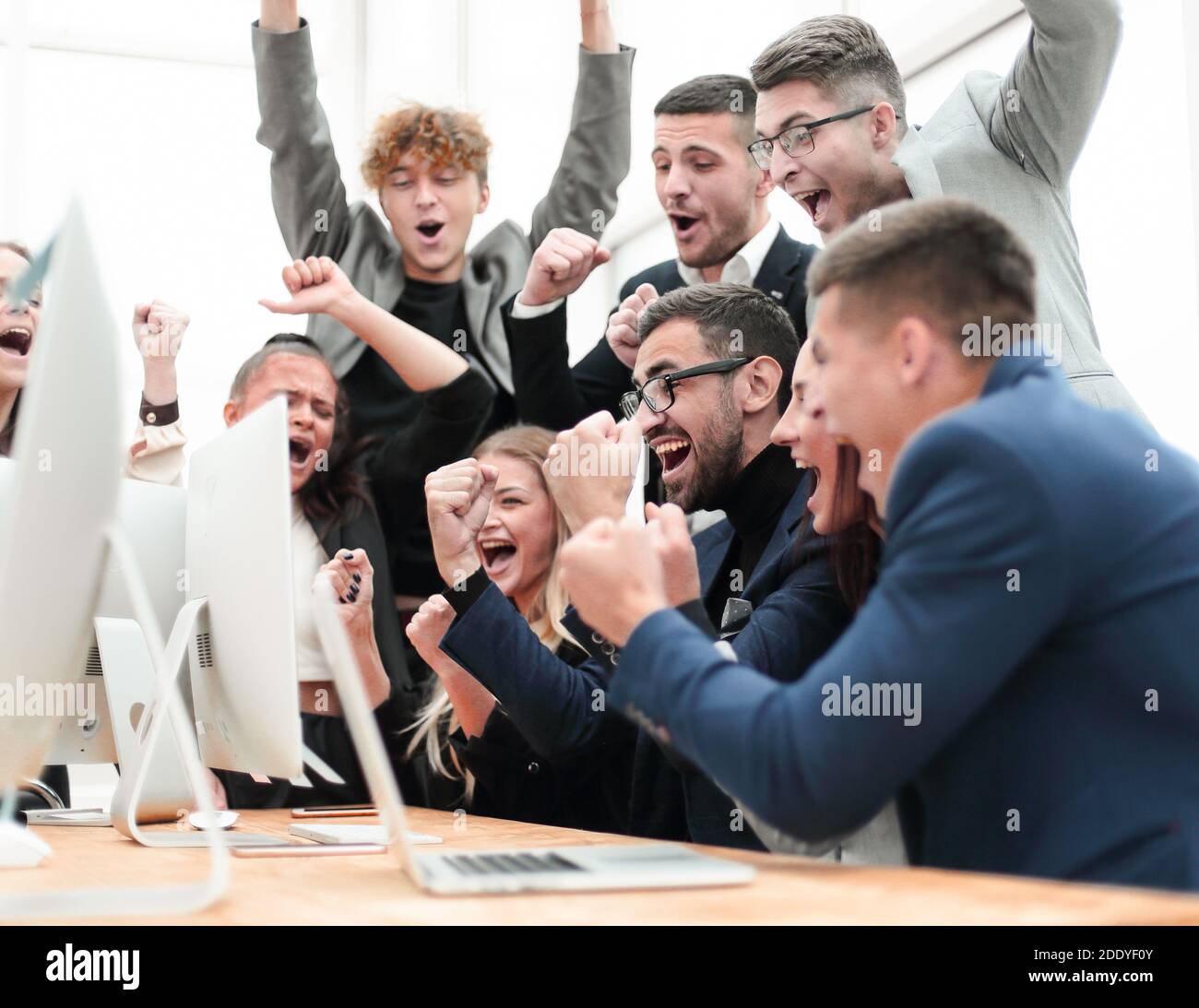 excited business team is jubilant in the workplace Stock Photo - Alamy