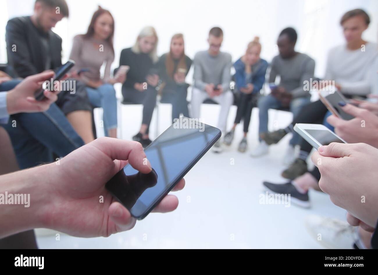 close up. groups of young people with smartphones Stock Photo - Alamy