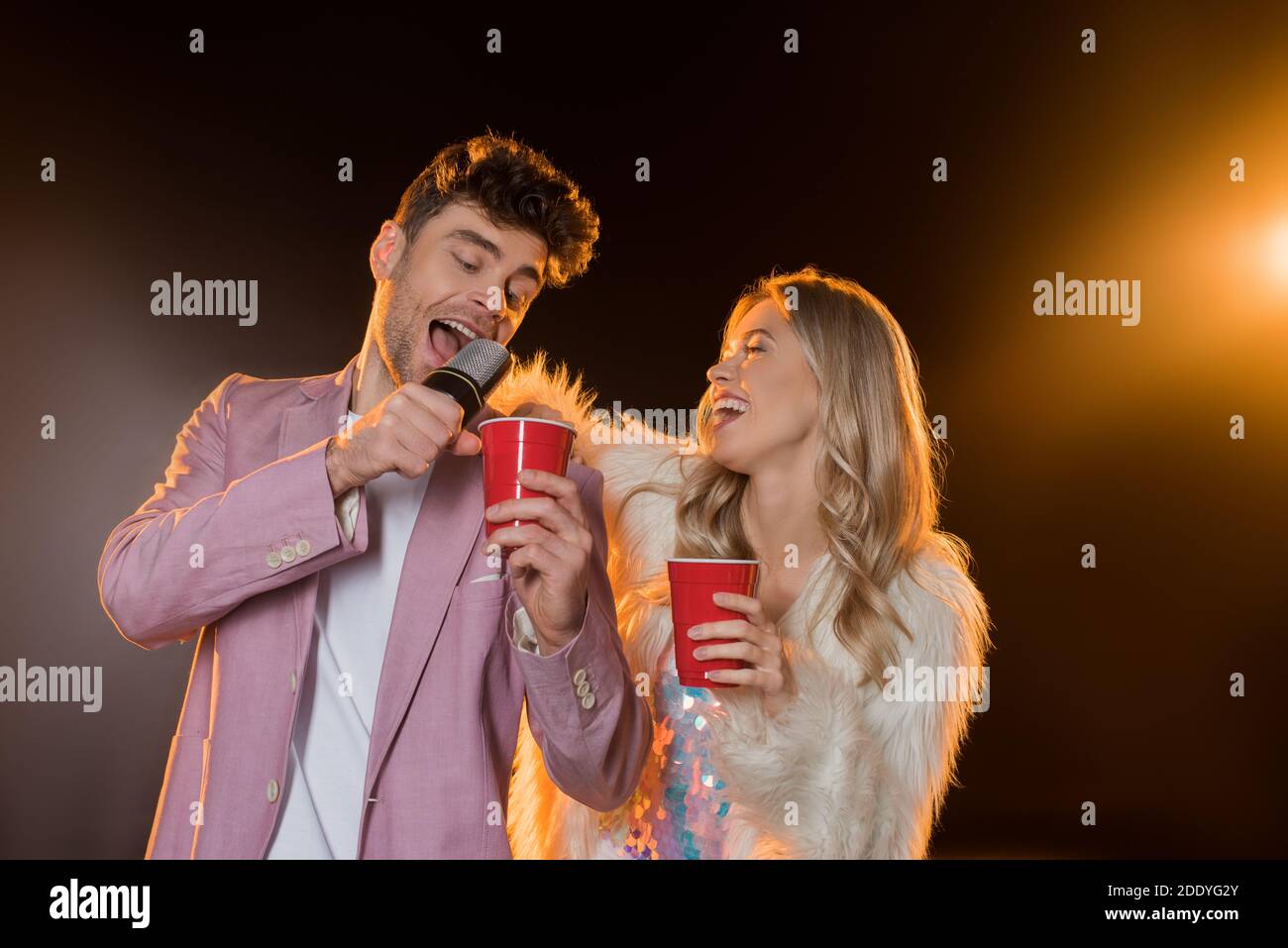 Microphone near his mouth hi-res stock photography and images - Alamy