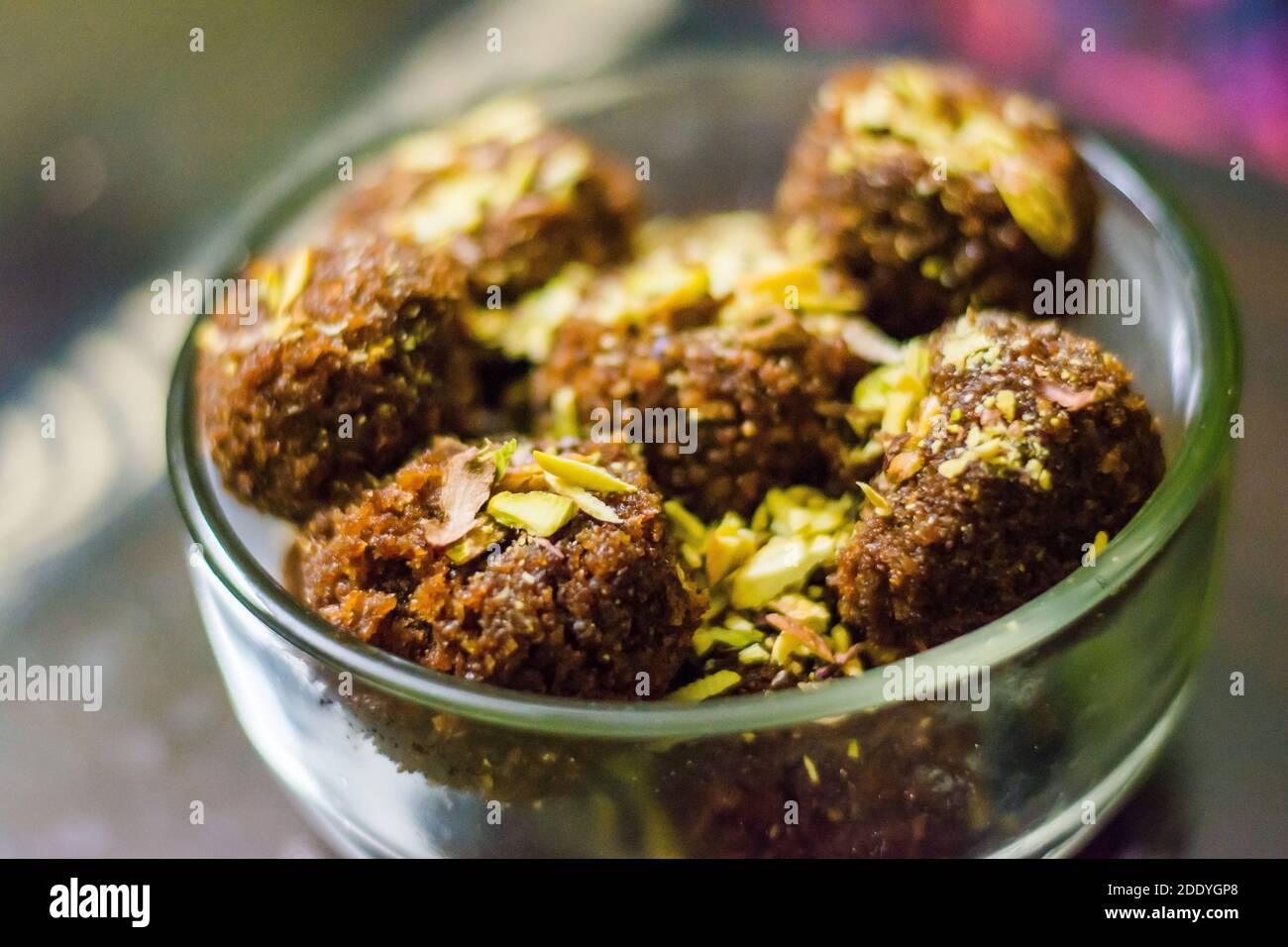 Fresh Homemade ladoo or laddu, made by bread crumbs with pistachio on ...