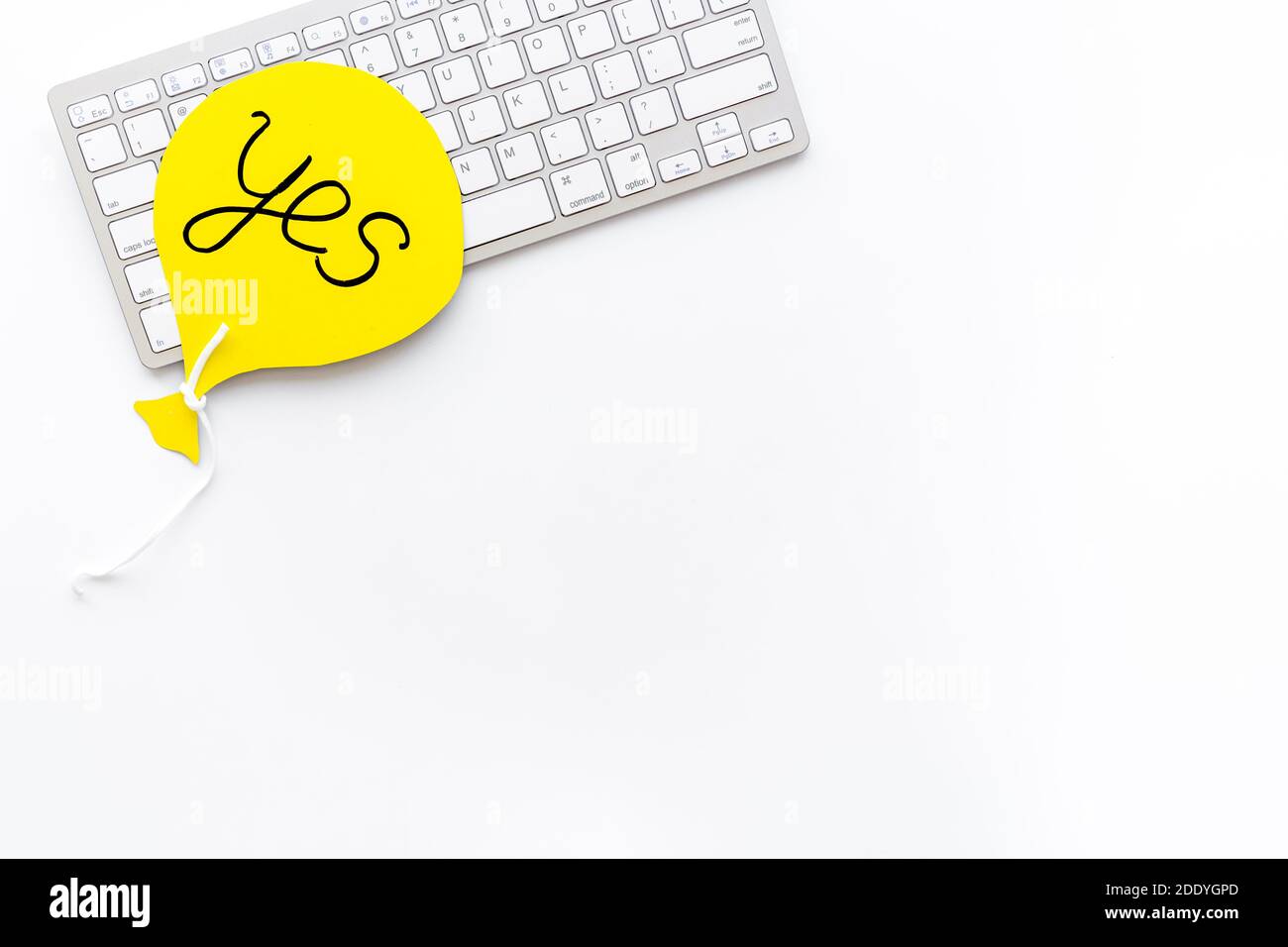 Yes agreement - decision concept. Word Yes on the keyboard, top view ...