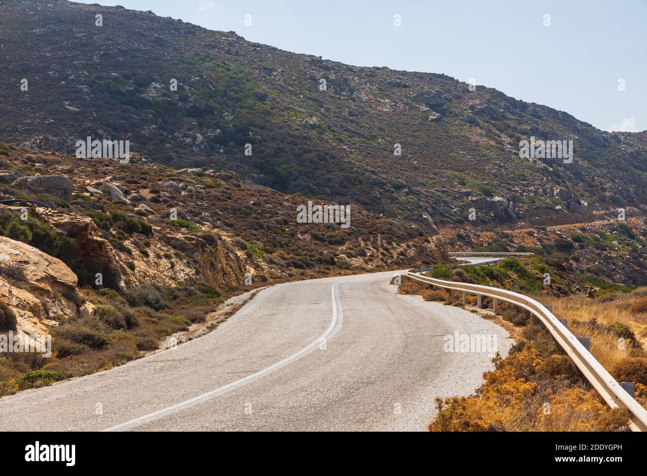 Scenic landscape view in Greek mountain, asphalt road, Ios Island ...