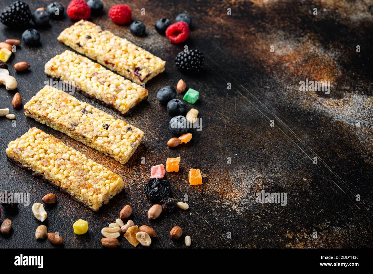 Fruit berry, nut energy bars. Healthy snack with copy space, on old ...