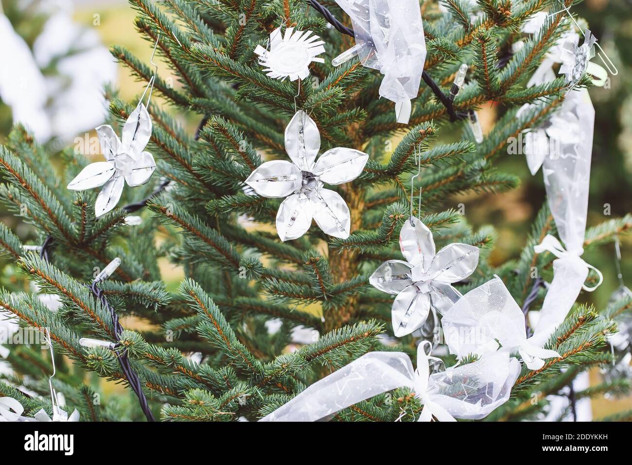 DIY foil decoration on a Christmas tree Stock Photo - Alamy