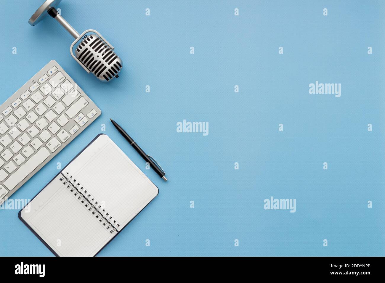 Microphone and keyboard on studio table, top view. Audio equipment and ...