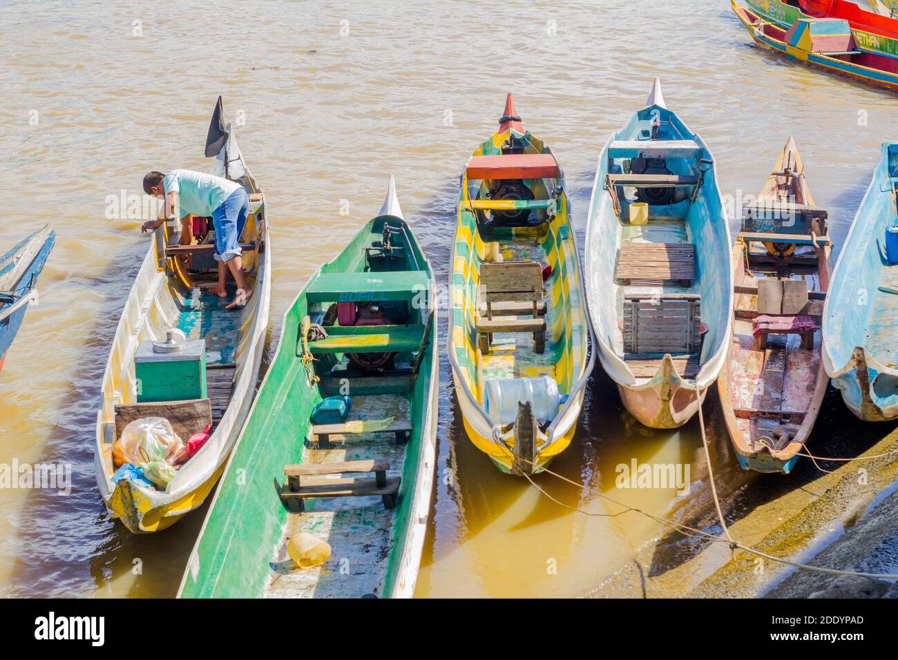 Local passenger river boats near the bridge of Pontevedra town in Capiz ...
