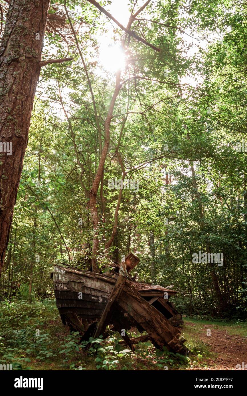 Old, abandoned, dilapidated boat in Mazirbe Boat Cemetery, which was ...