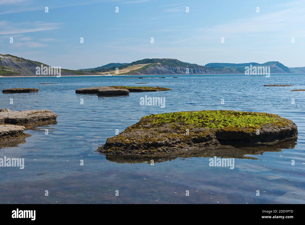 The rock ledges exposed at low tide in front of Church Cliffs at the ...