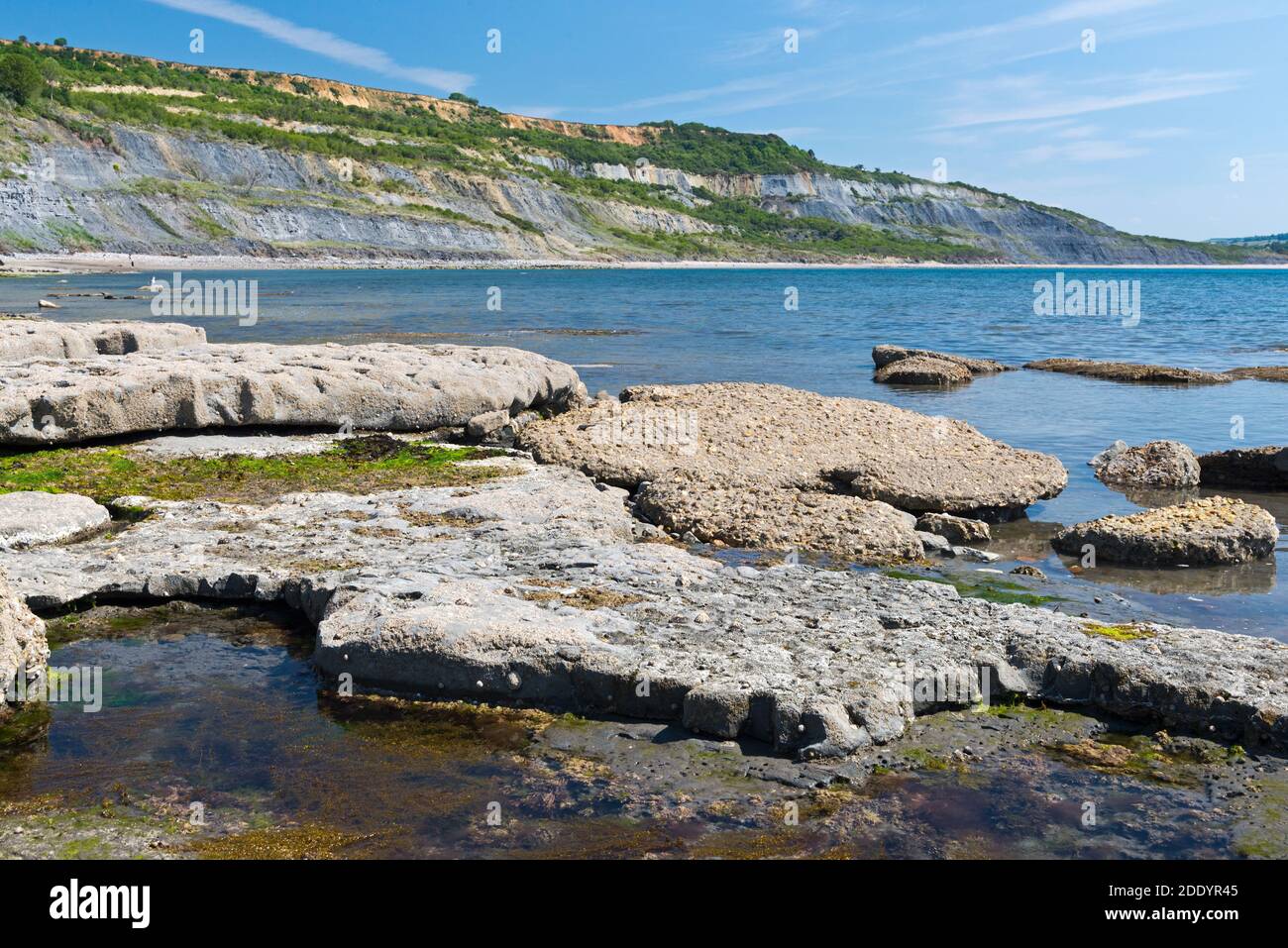 The rock ledges exposed at low tide in front of Church Cliffs at the ...