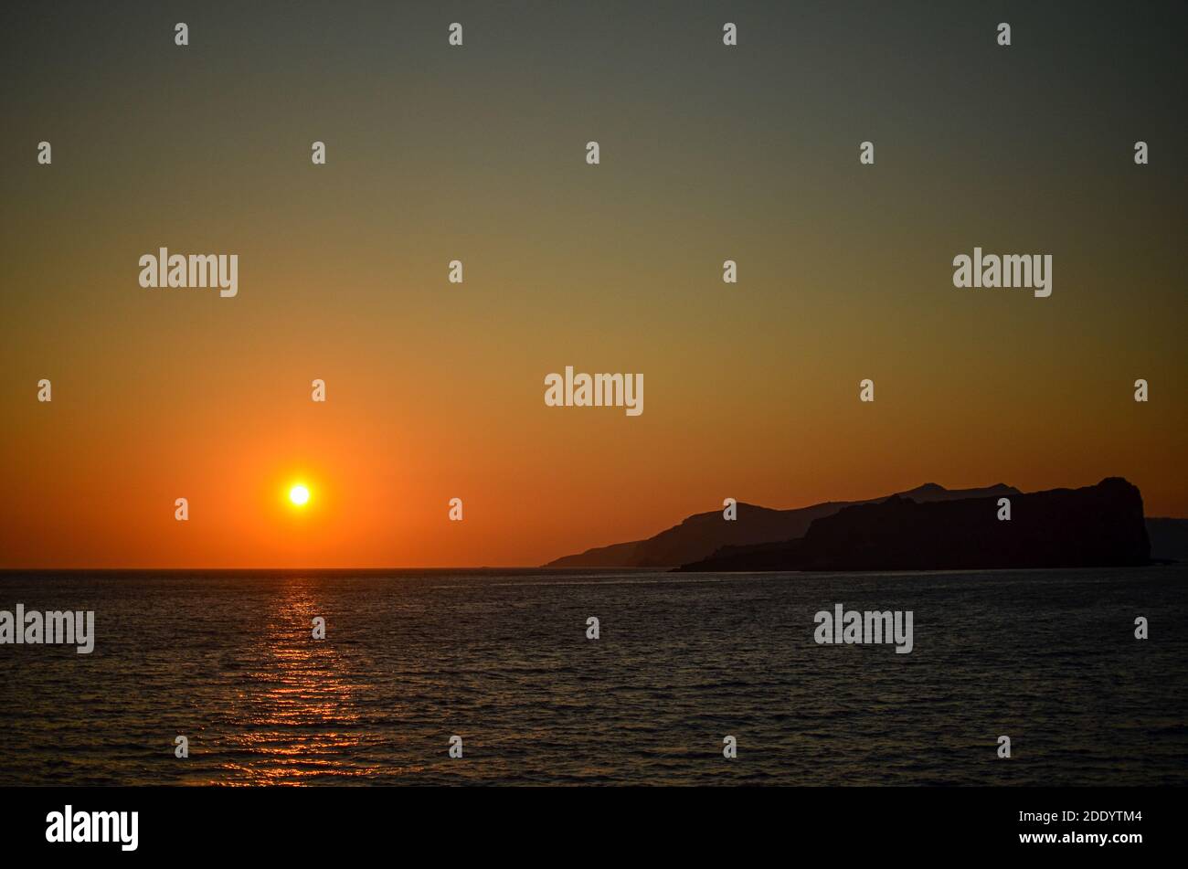 Sunset from Anafi's port Stock Photo - Alamy