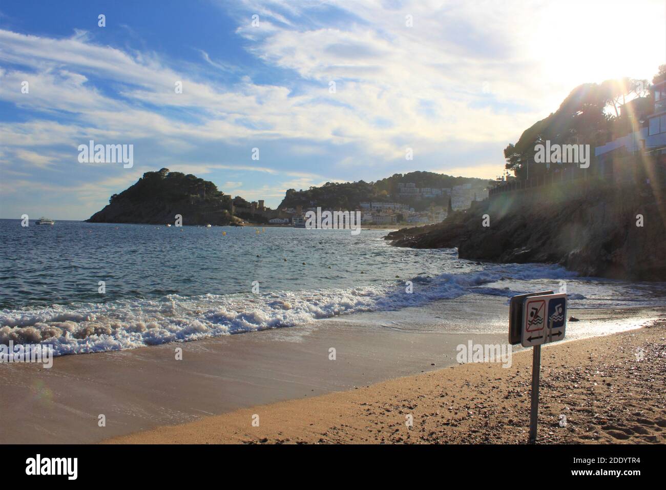 Spanish sea view looking out to waves and rocks from a beach Stock ...