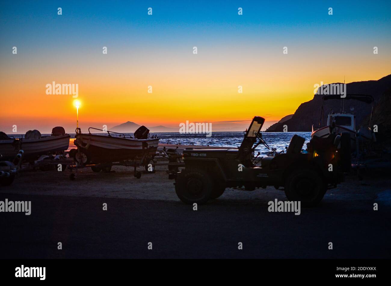 Sunset on Anafi's port Stock Photo - Alamy