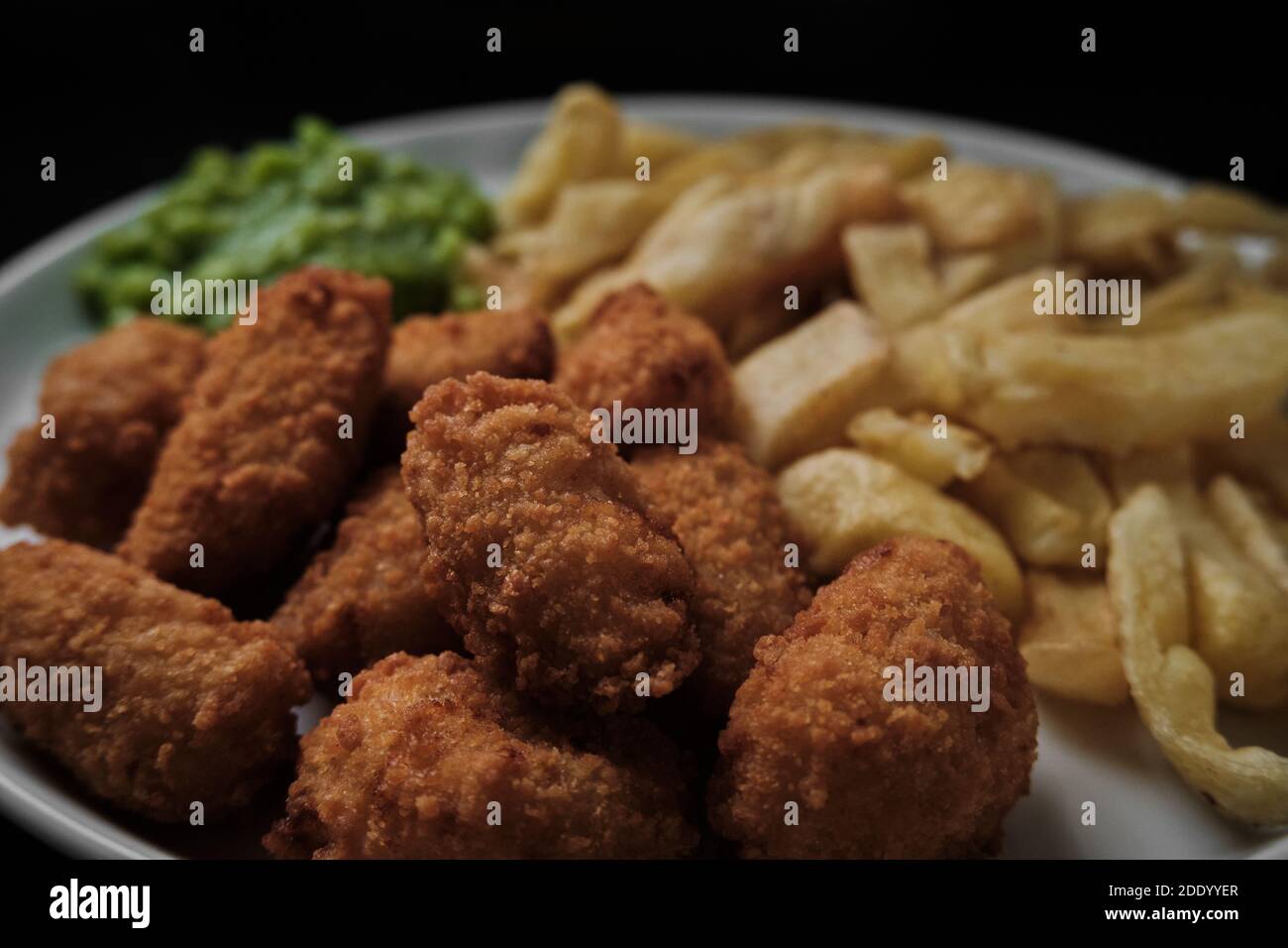 Scampi, chips and mushy peas, British classic fish and chips restaurant ...