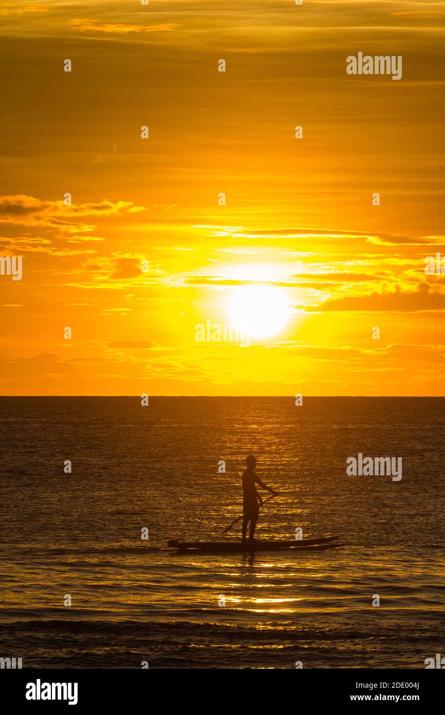 Paddle boarding during sunset in Boracay Island, Philippines Stock ...