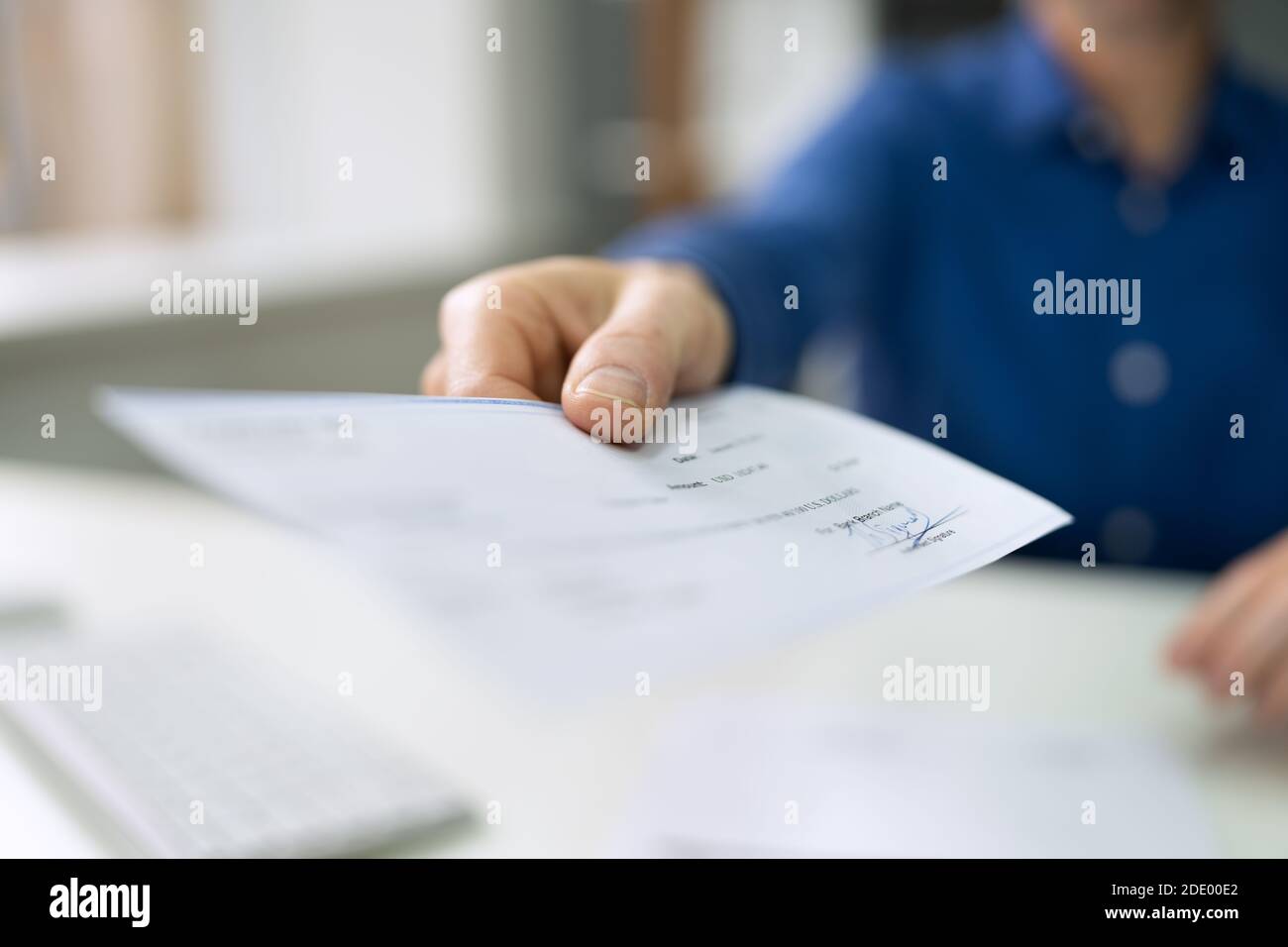 Handing Employee Payroll Cheque. Security Check And Salary Checkbook ...