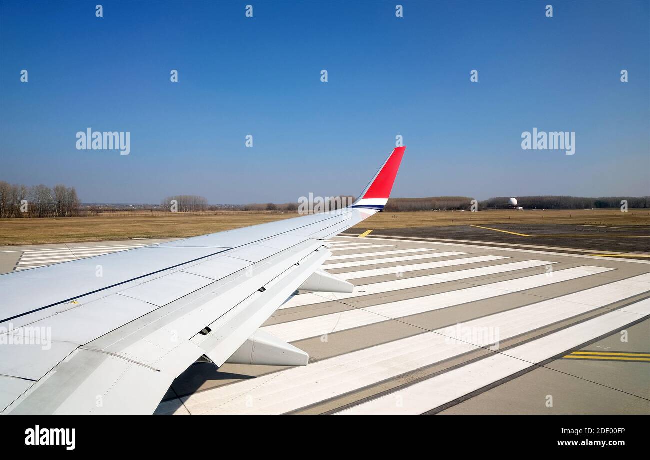 Wing of a plane during the flight Stock Photo - Alamy