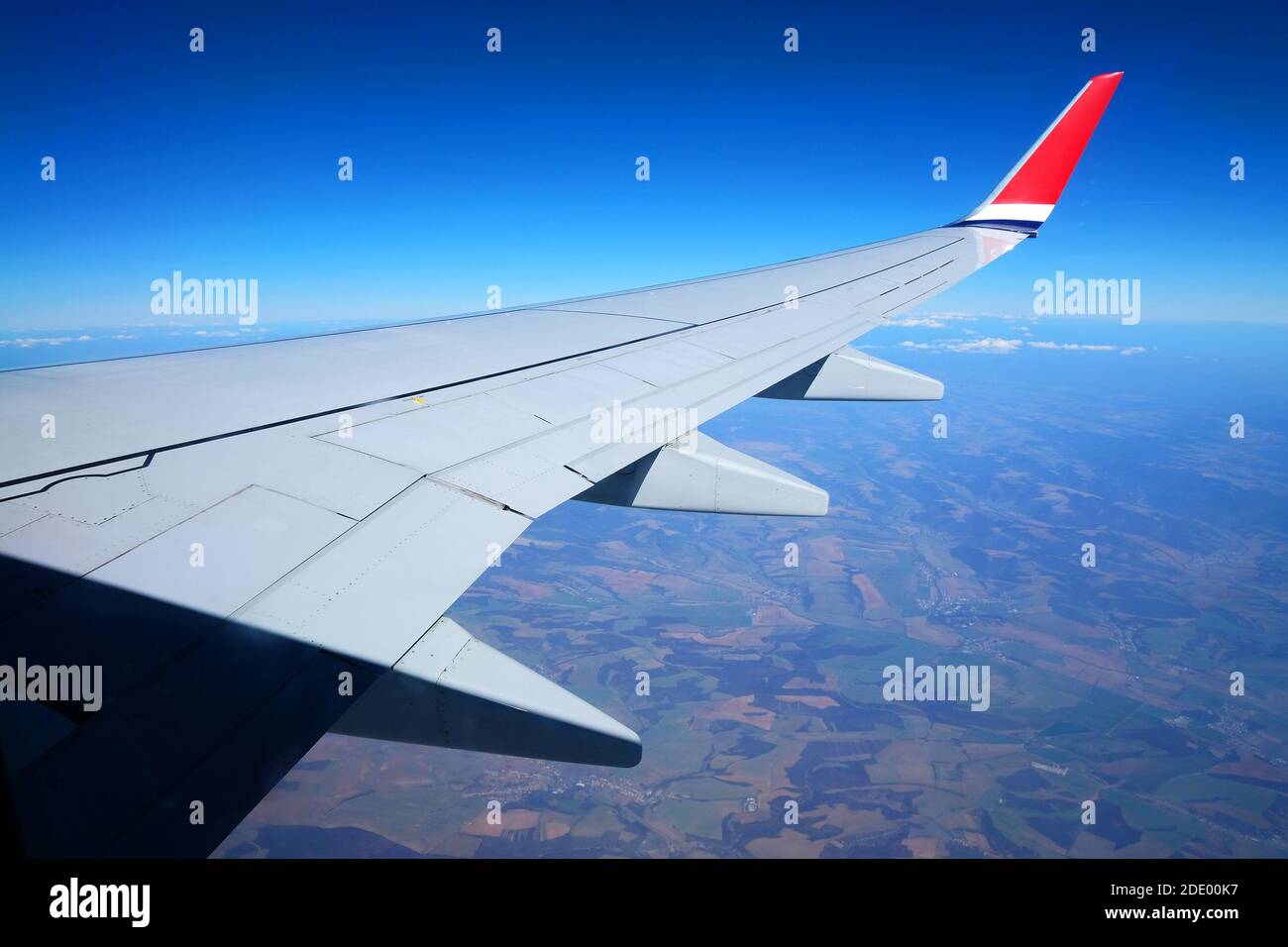 Wing of a plane during the flight Stock Photo - Alamy