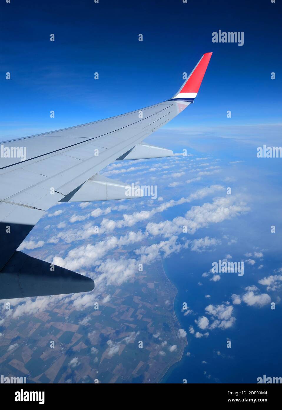 Wing of a plane during the flight Stock Photo - Alamy