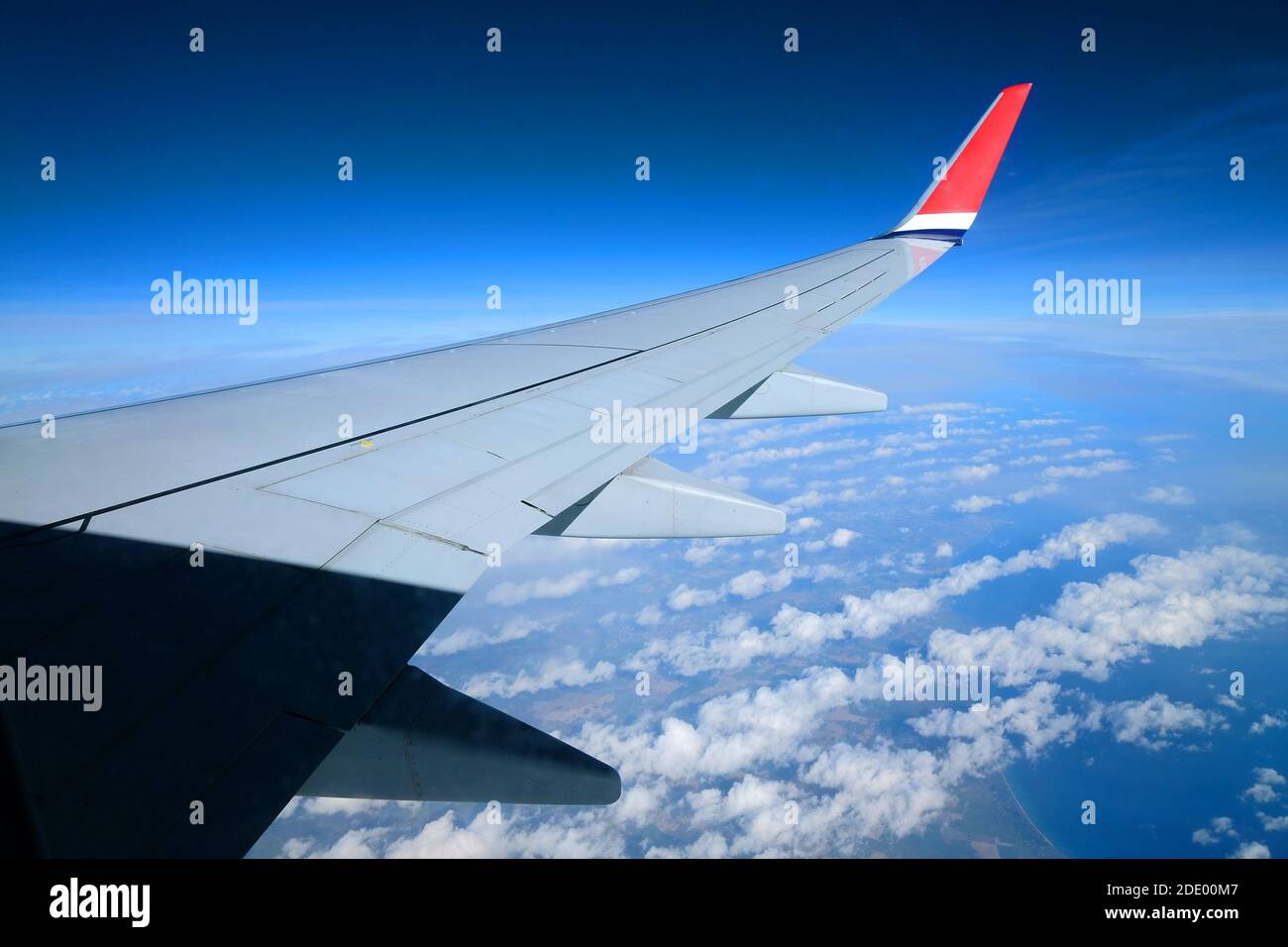 Wing of a plane during the flight Stock Photo - Alamy