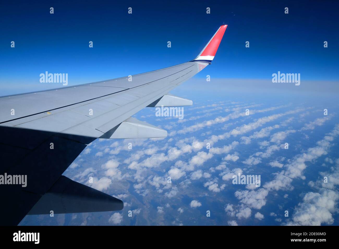 Wing of a plane during the flight Stock Photo - Alamy