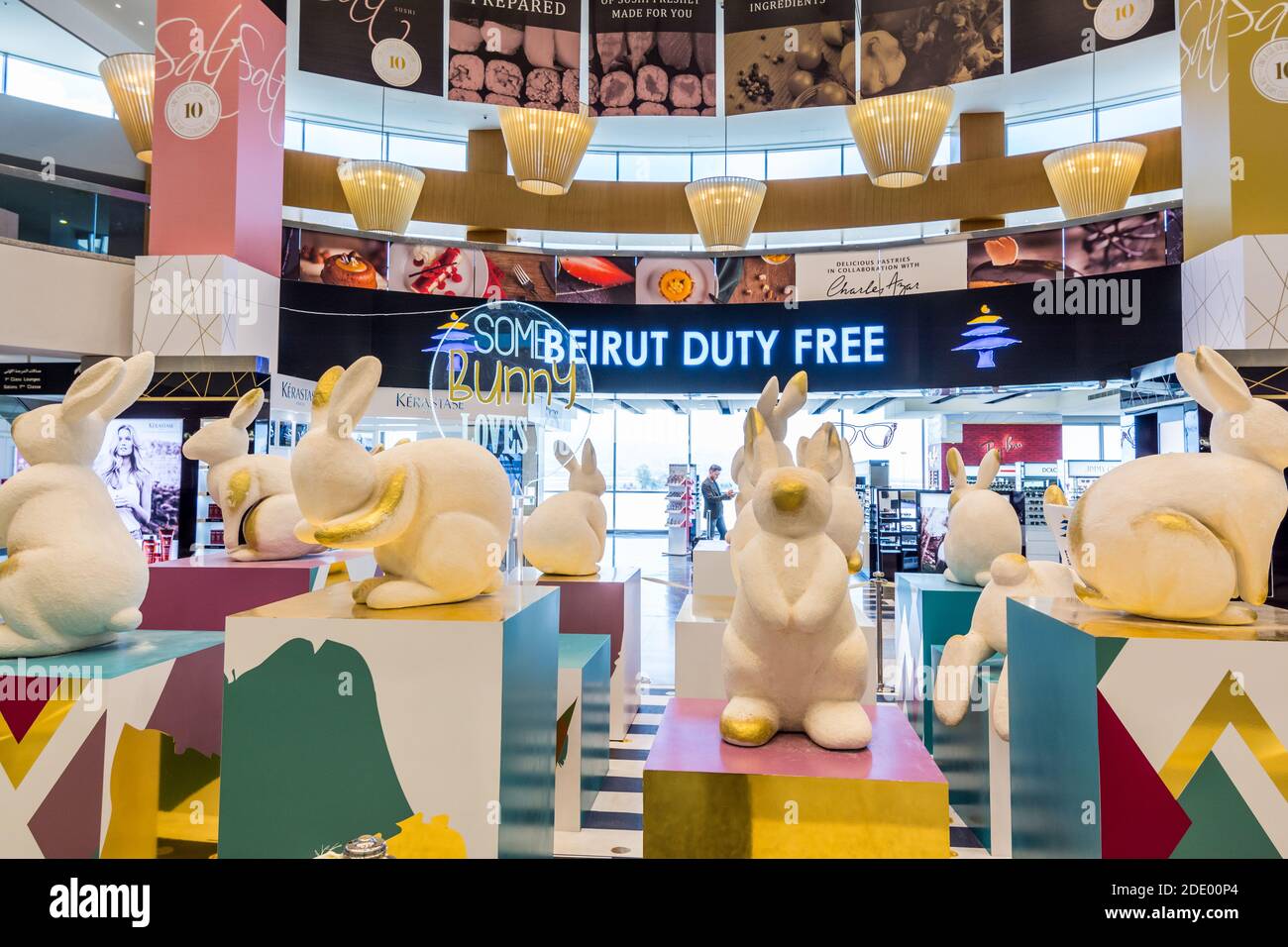 White rabbits sculptures in front of duty free shops in at the ...