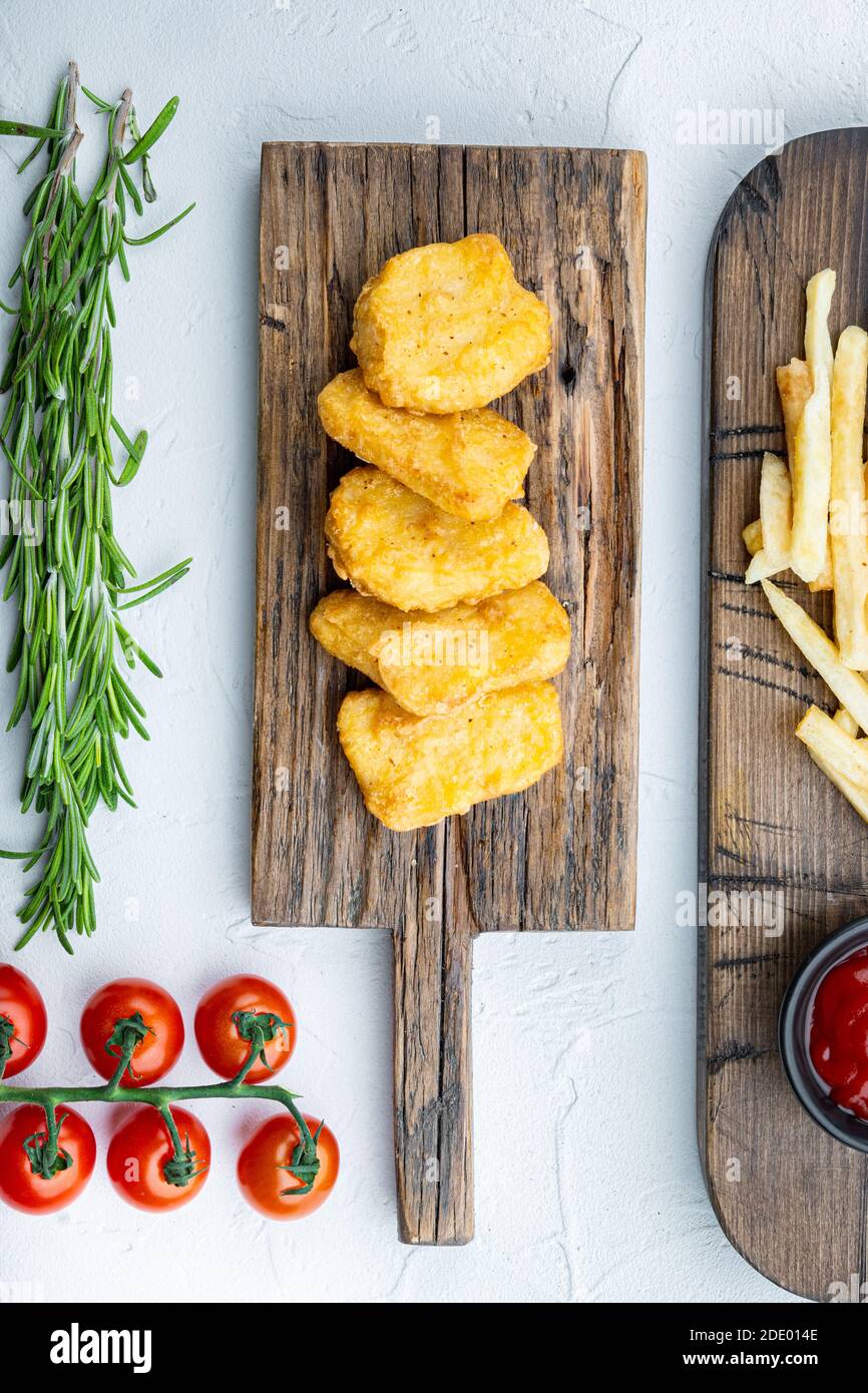 Chicken nuggets fried on white background, flat lay Stock Photo - Alamy