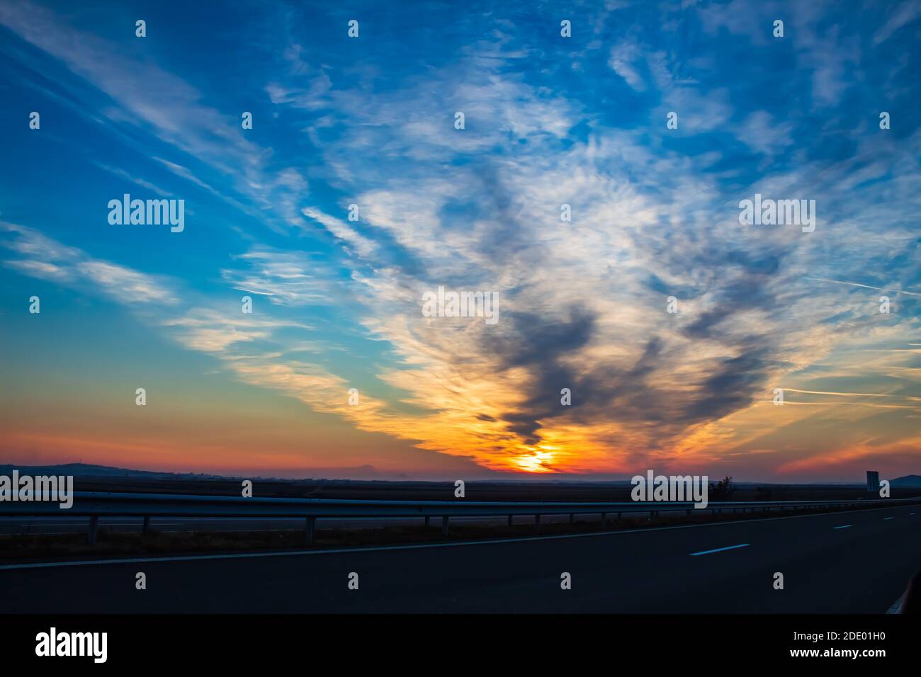 Sun setting over Tracia Highway Stock Photo - Alamy