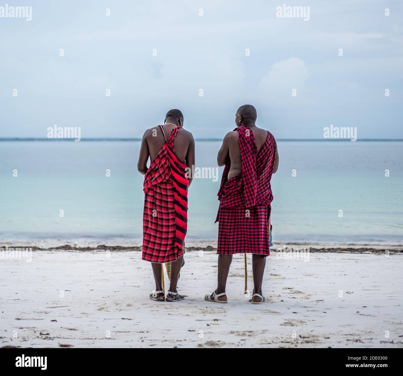 African tribe men on beach Stock Photo - Alamy